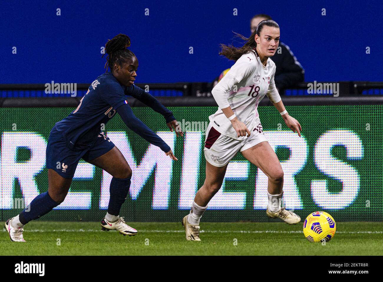 Riola Xhemaili of Switzerland (R) plays against Sandy Baltimore of ...