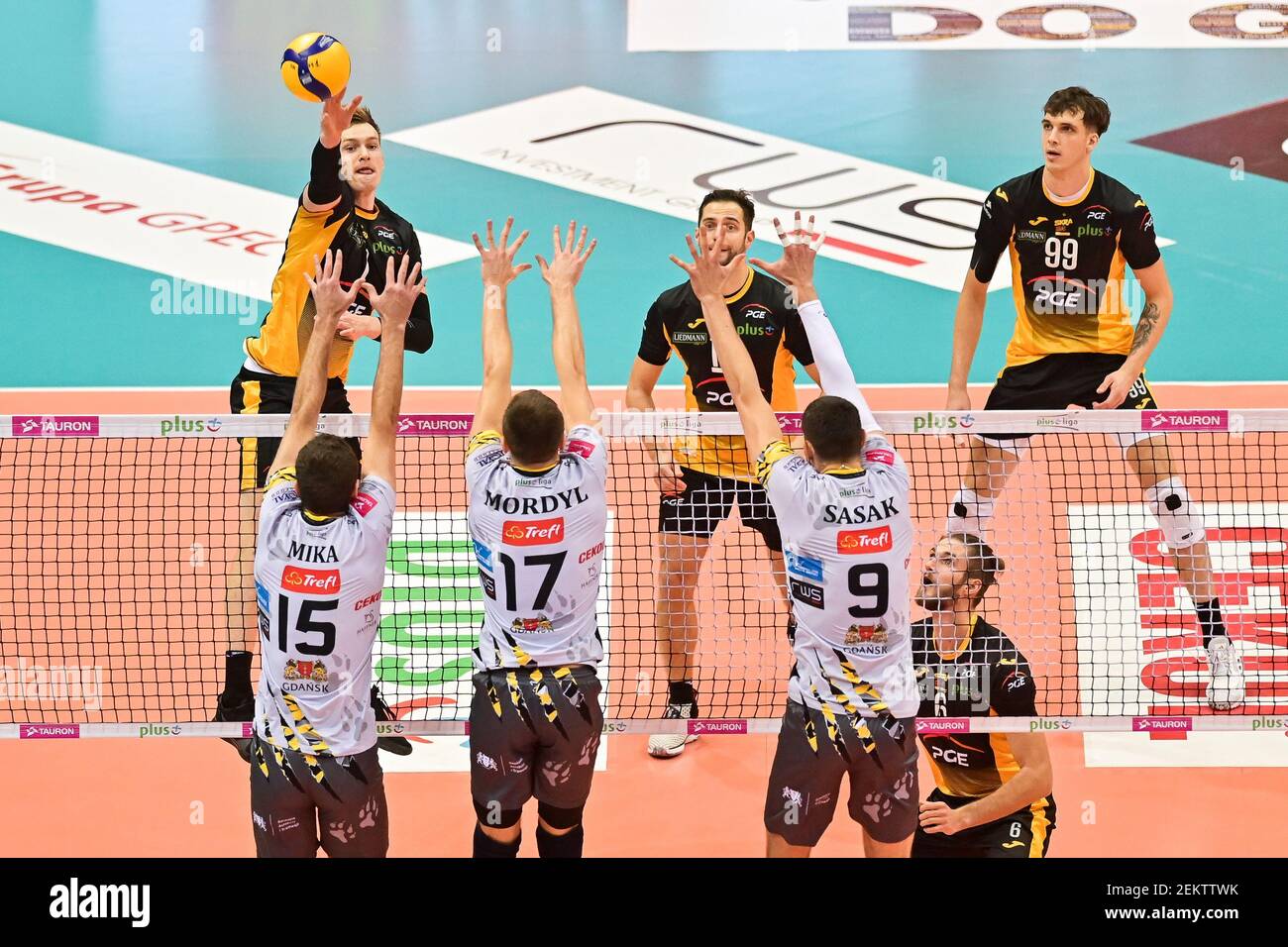 Bartosz Filipiak (L) of Skra in action during the Plus Liga match ...