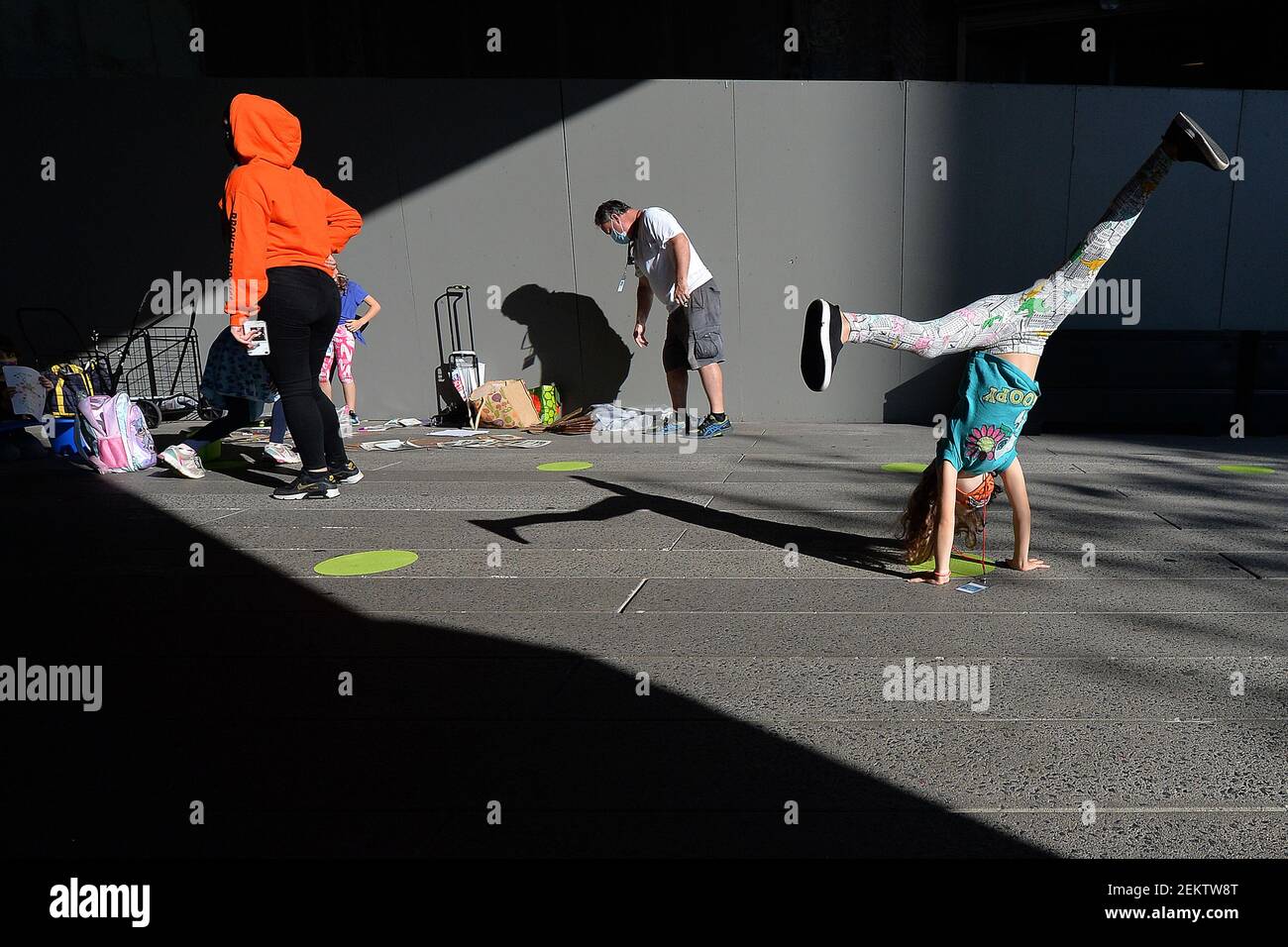 Ava, 6, performs a cartwheel as she and other students from PS 11 ...