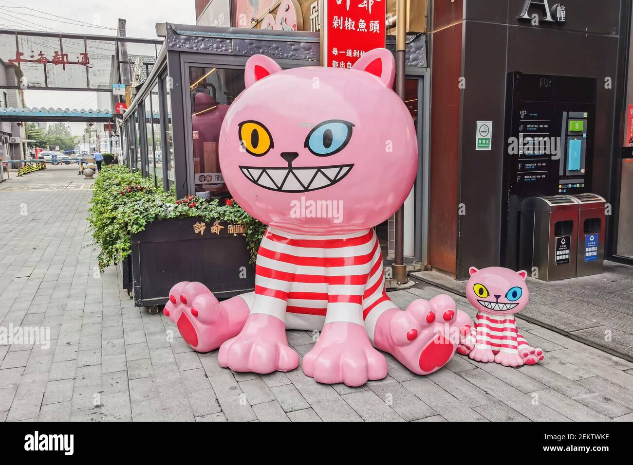A giant Kuncat model is set up by the gate of a shopping mall to ...