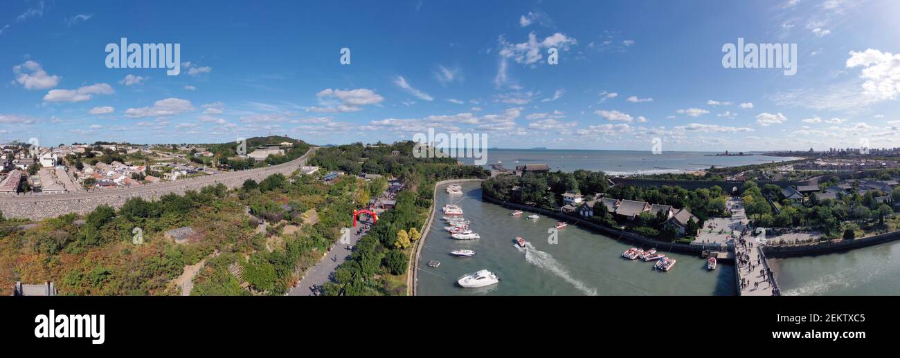 --FILE--Landscape photos of tourists enjoying good weather and ...