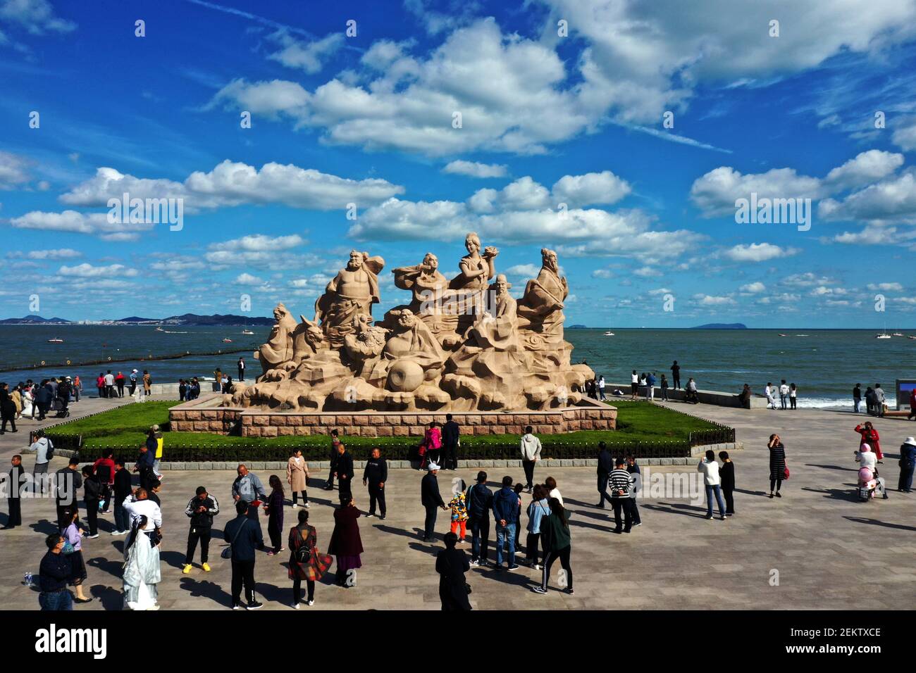 --FILE--Landscape photos of tourists enjoying good weather and ...