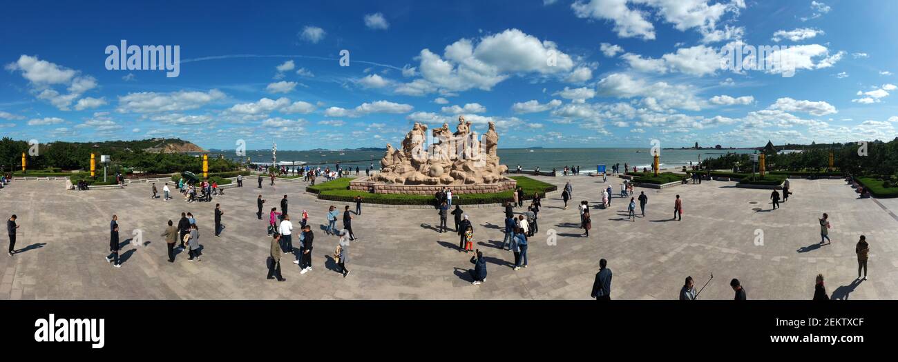 --FILE--Landscape photos of tourists enjoying good weather and ...