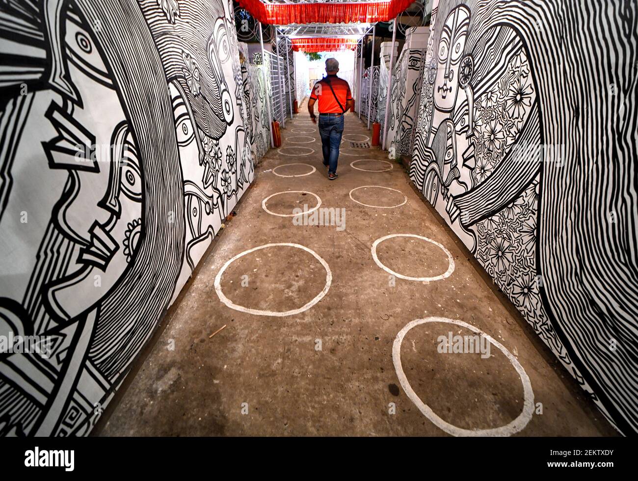 White social distancing circle marks are seen while entering a Temple ...