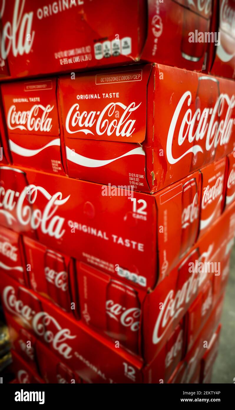 Cases of Coca-Cola cans in a supermarket in New York on Friday, January ...