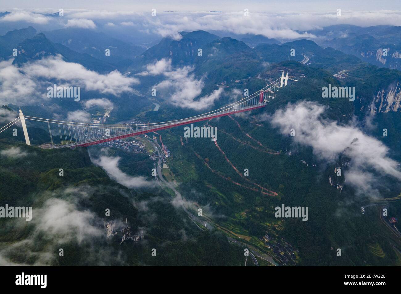 The sea of clouds appears around the Aizhai Suspension Bridge in Aizhai ...