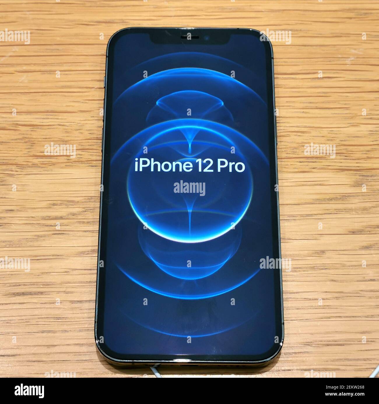 An iPhone of the new 12 series is on display at a flagship in Shanghai ...