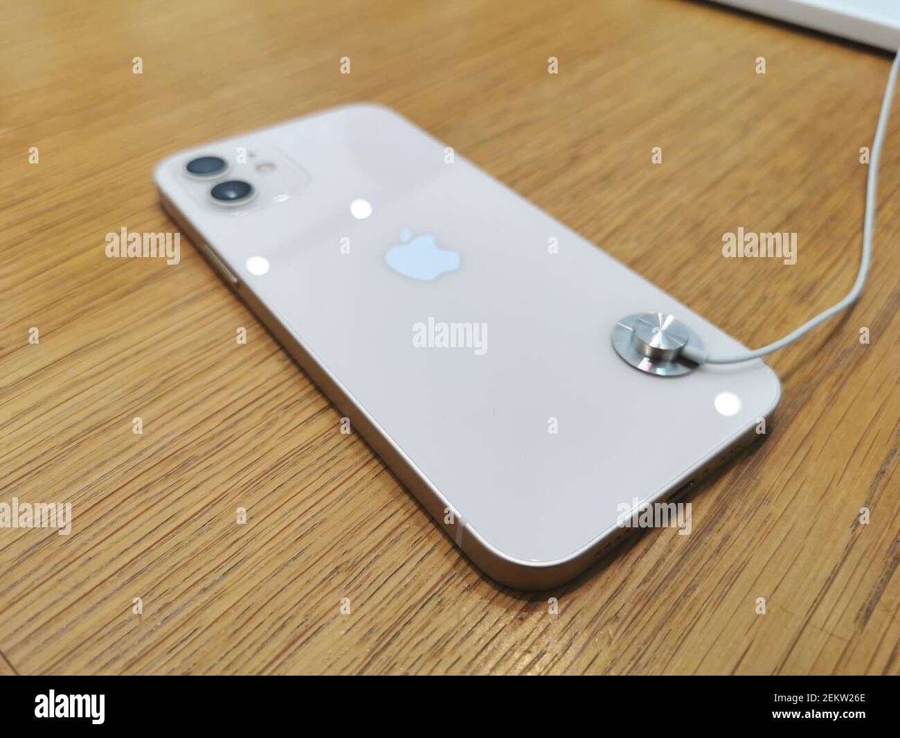 An iPhone of the new 12 series is on display at a flagship in Shanghai ...