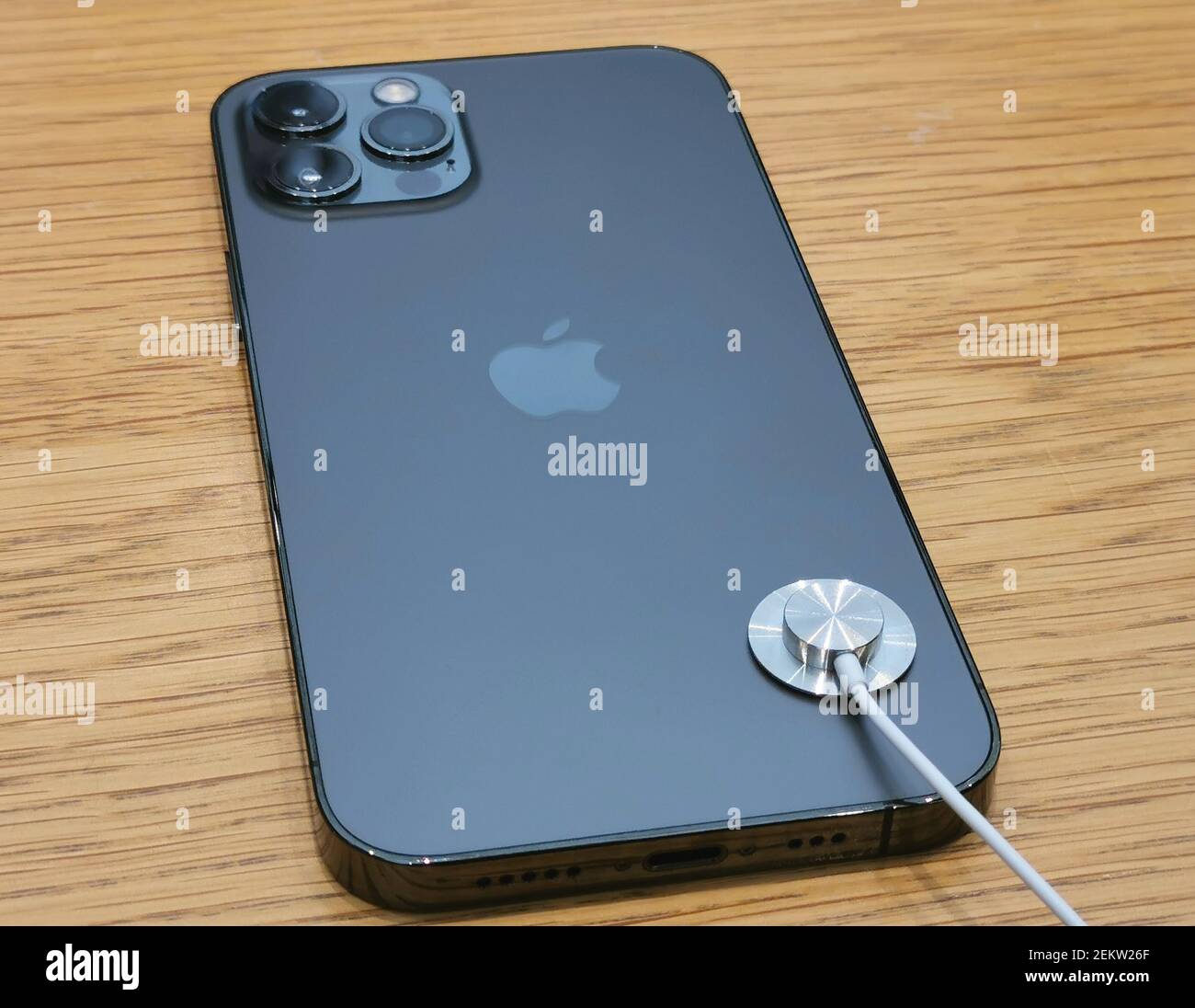 An iPhone of the new 12 series is on display at a flagship in Shanghai ...