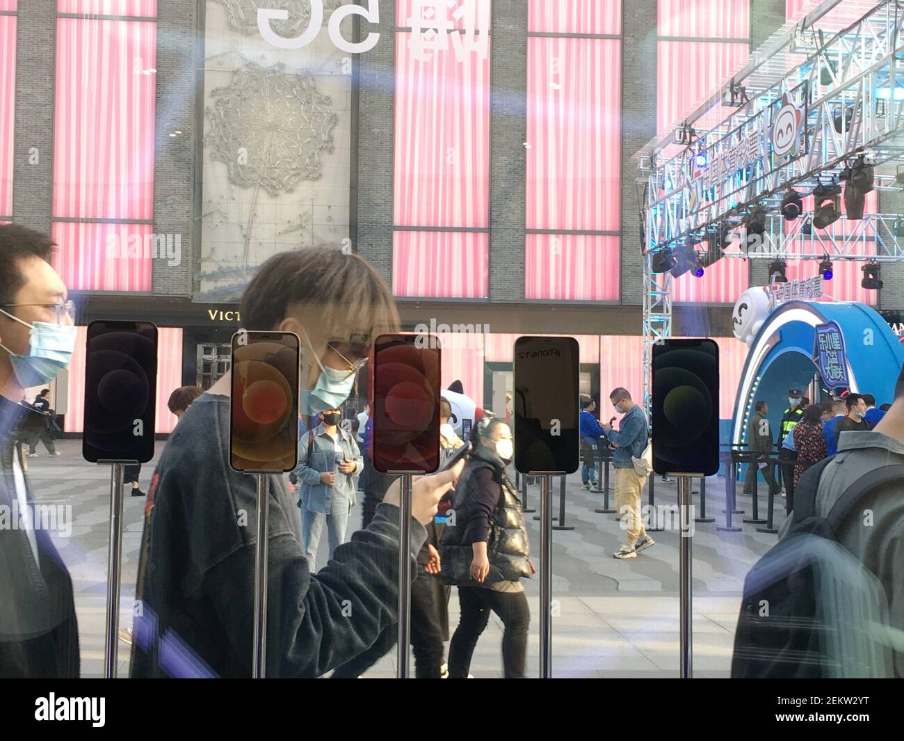 HANGZHOU, CHINA - OCTOBER 23, 2020 - Apple fans line up at Apple's ...