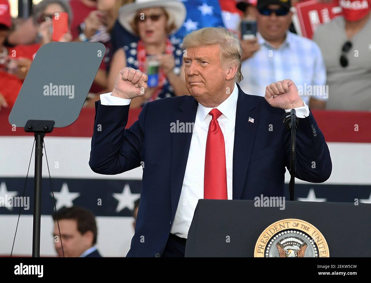 U.S. President Donald Trump gestures as he takes the stage to speak ...