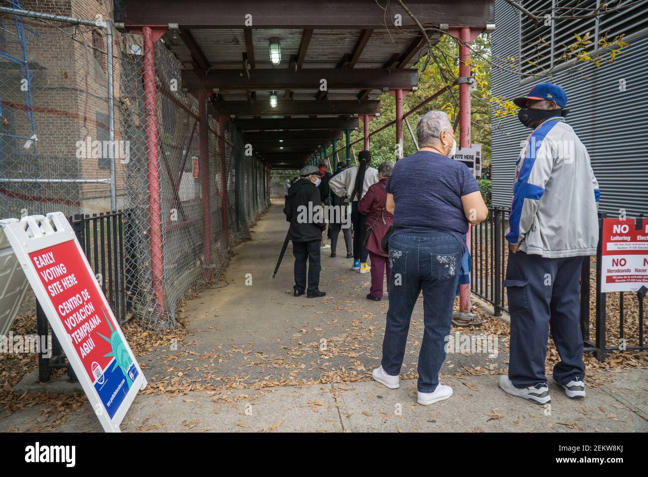 People waiting for hours on long lines in the Bronx, NY as early voting ...