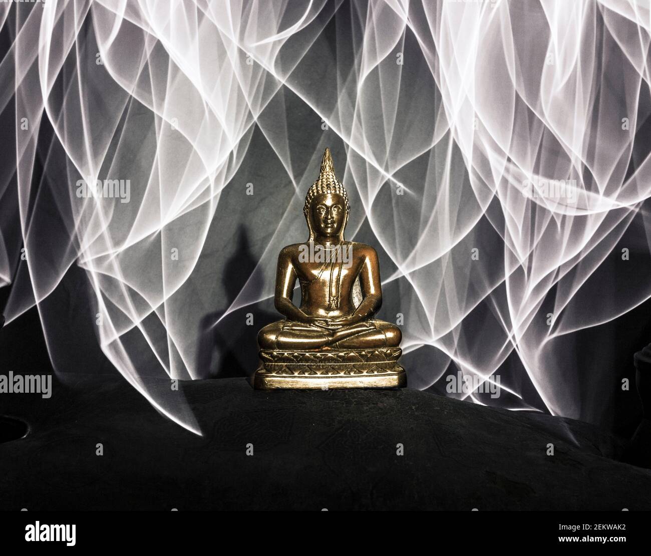 Bronze buddha statue with special effects hi-res stock photography and ...