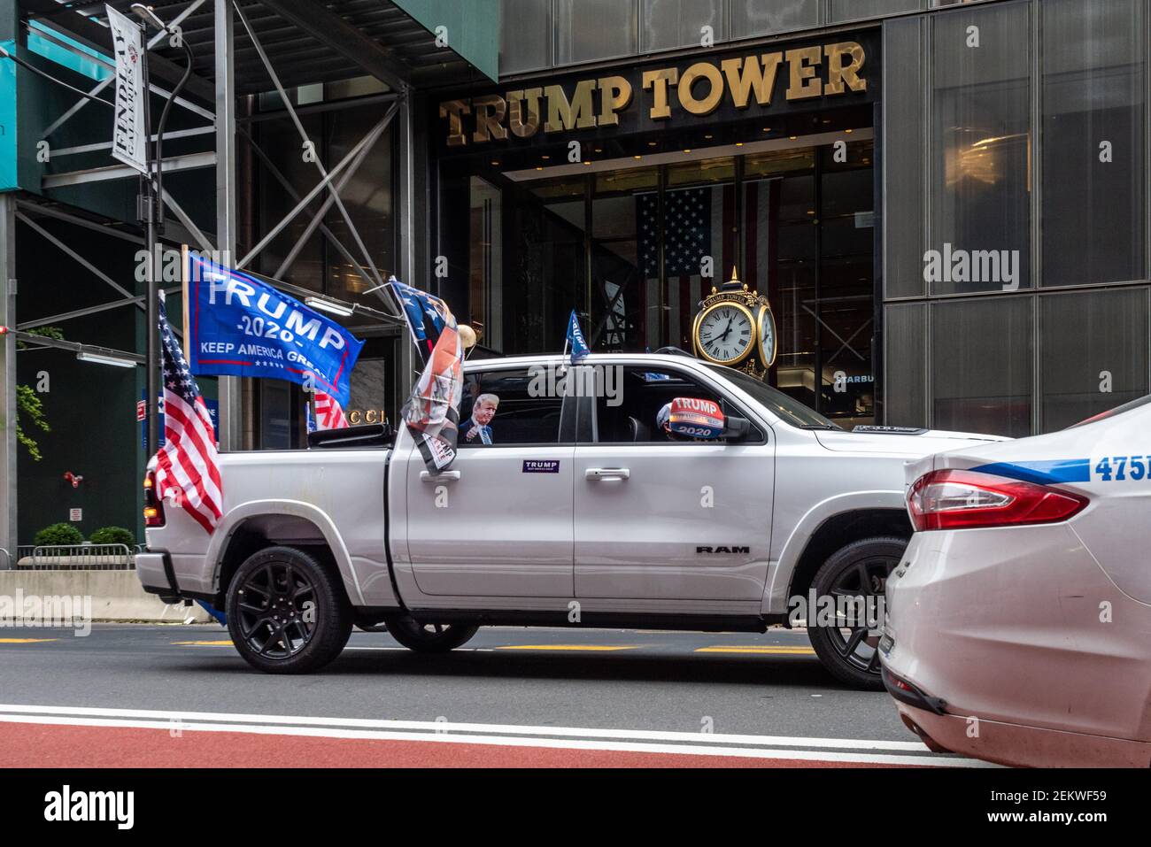 A Trump Train passes by Trump Tower in New York City on October 25 ...