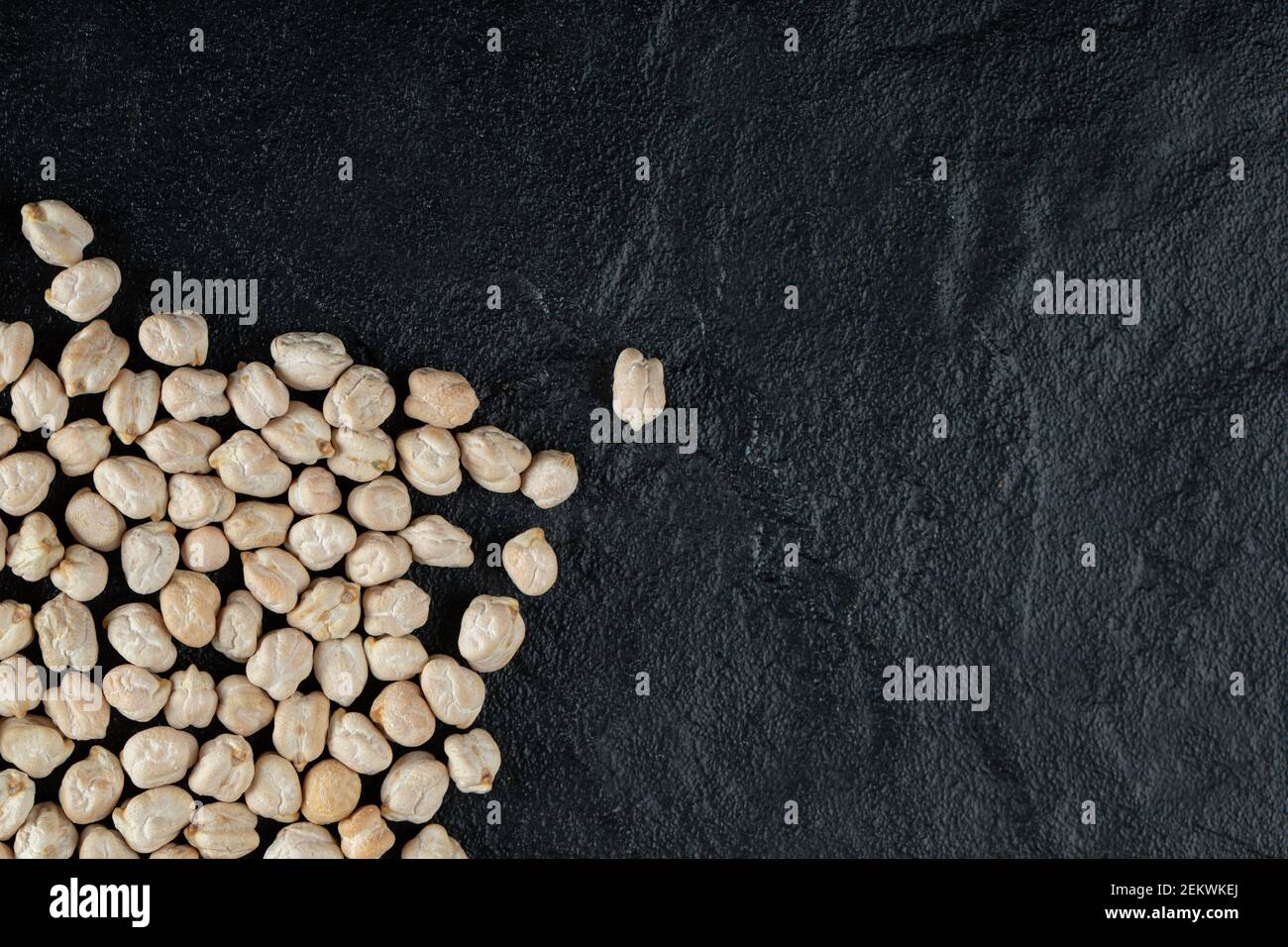 Pile of uncooked beans on dark surface Stock Photo - Alamy