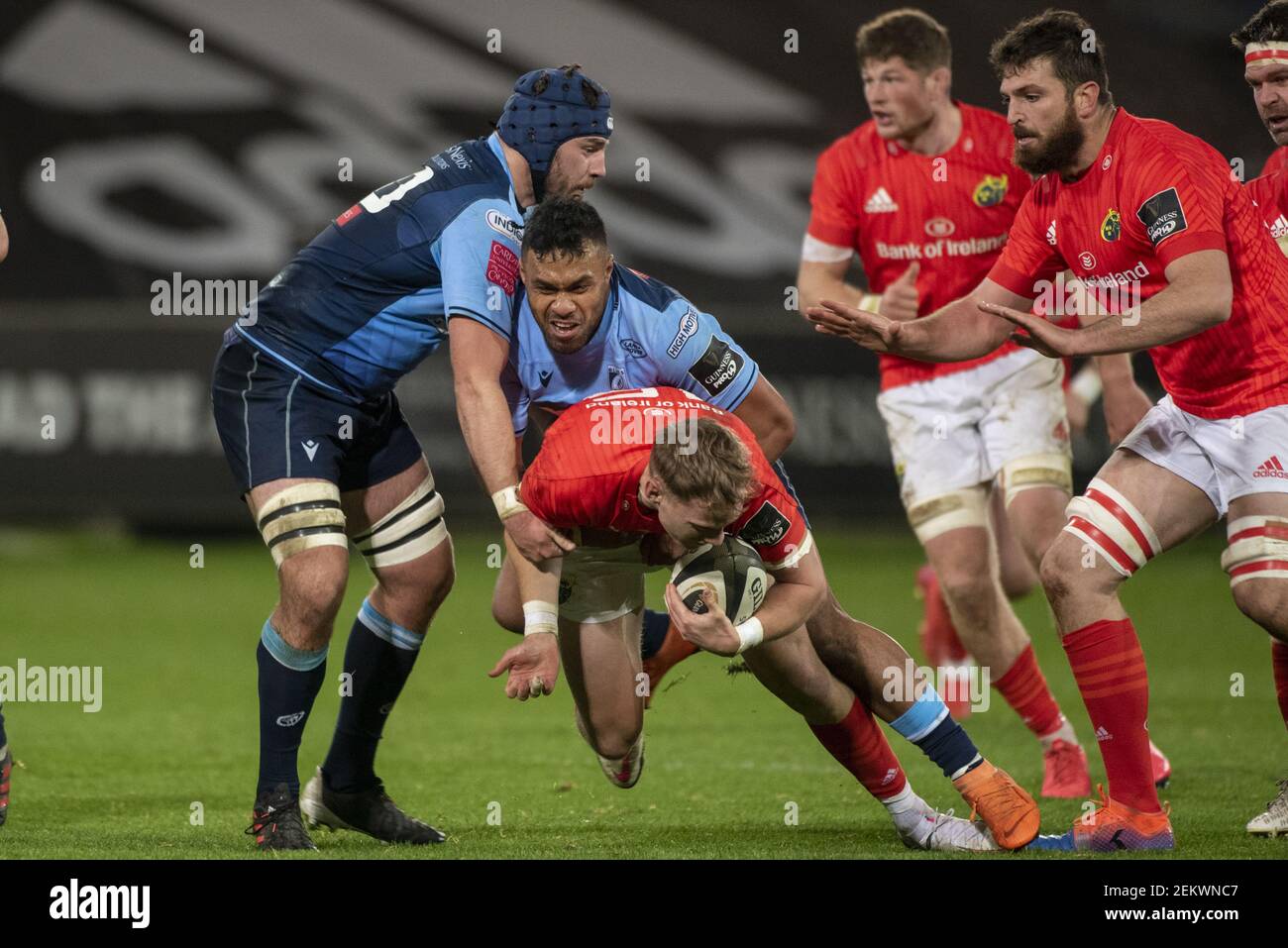 Mike Haley of Munster tackled by Willis Halaholo of Cardiff and Alun ...