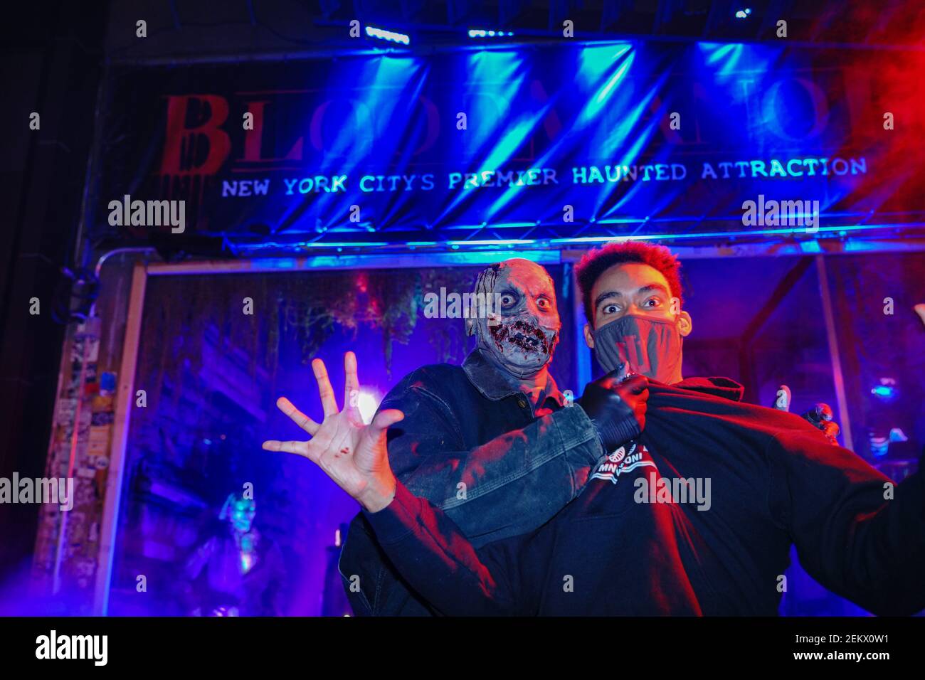 Joshua â€œZekeâ€ Thomas poses in front of Blood Manor Haunted ...