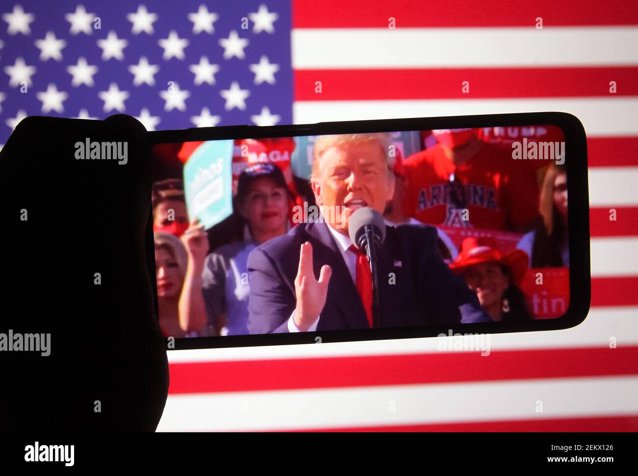 In this photo illustration, US President Donald Trump seen speaking ...