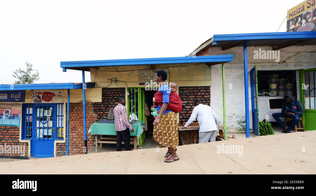 A Rwandan woman carrying her baby in Kigali, Rwanda Stock Photo - Alamy