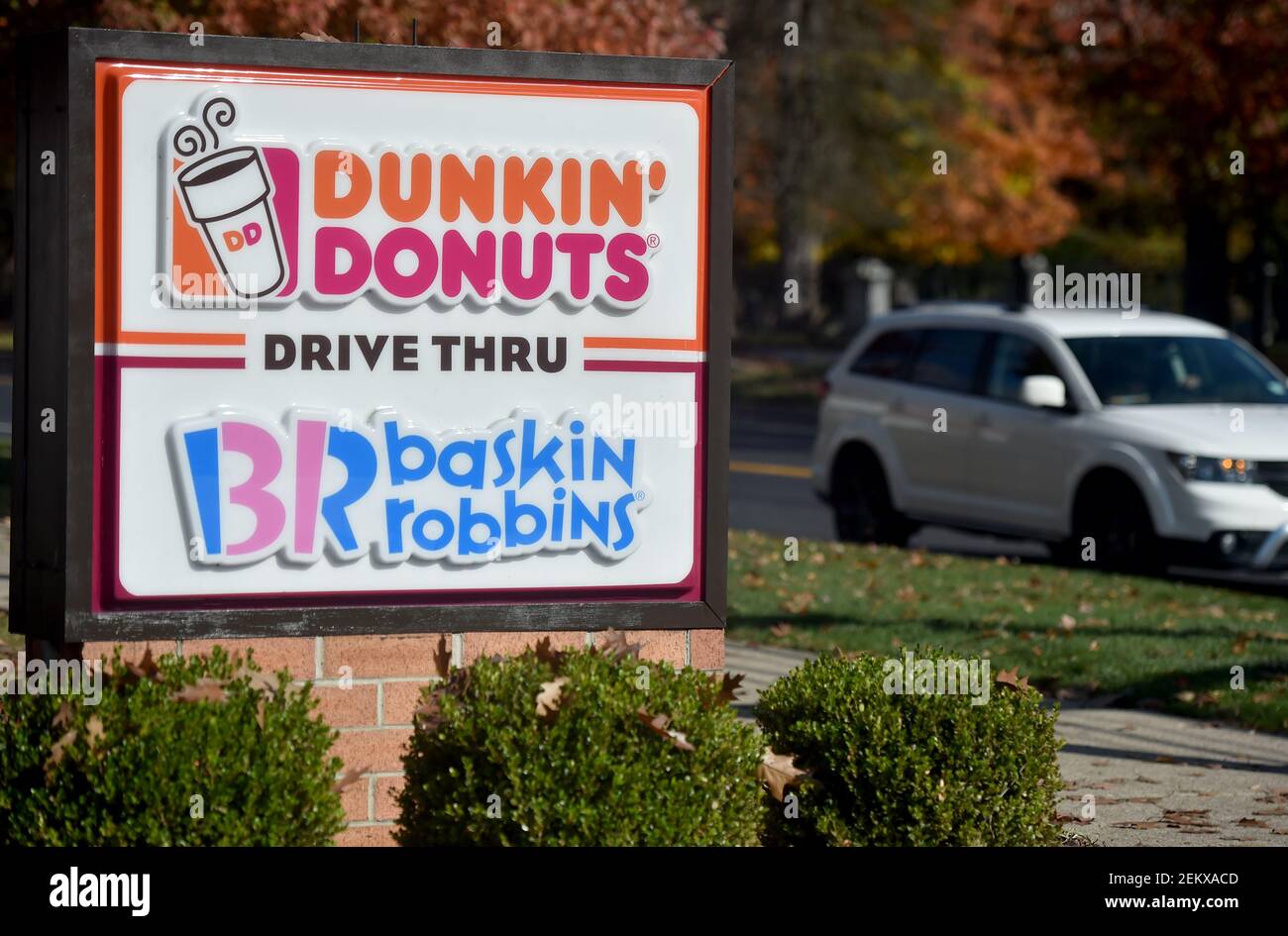 Dunkin' Donuts sign at their store in Kingston. Dunkin Donuts / Baskin ...