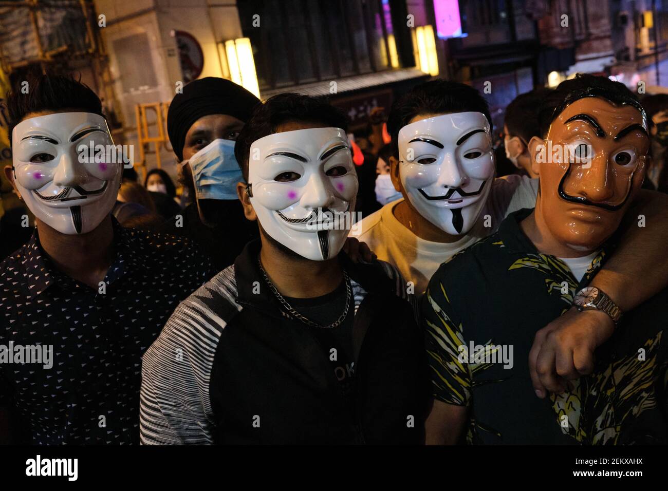 Participants wearing masks during Halloween. Revellers take part in a ...
