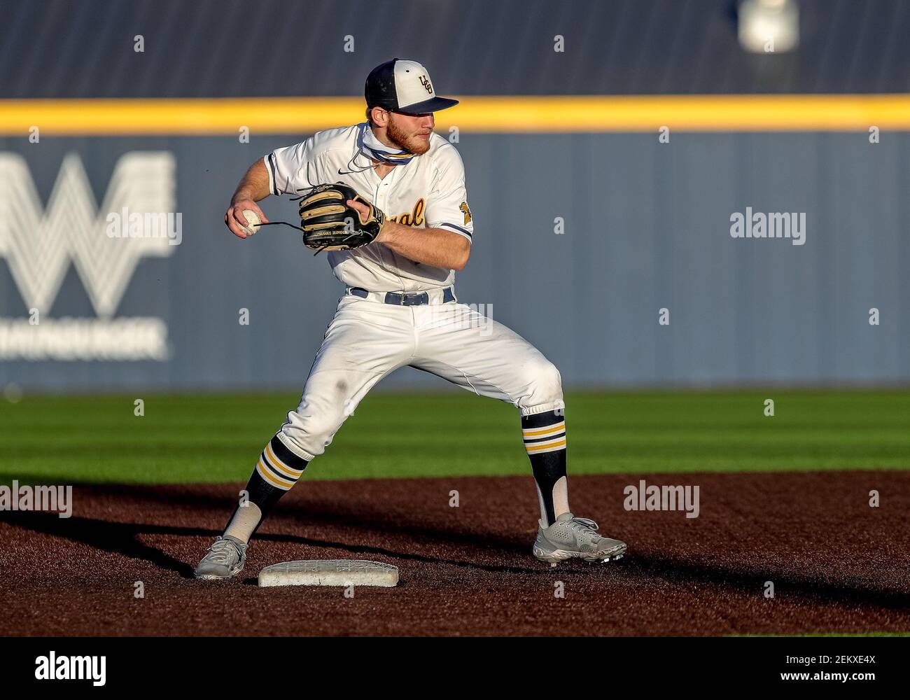 February 23, 2021: Central Oklahoma infielder Colton Bertus (1) turns a ...