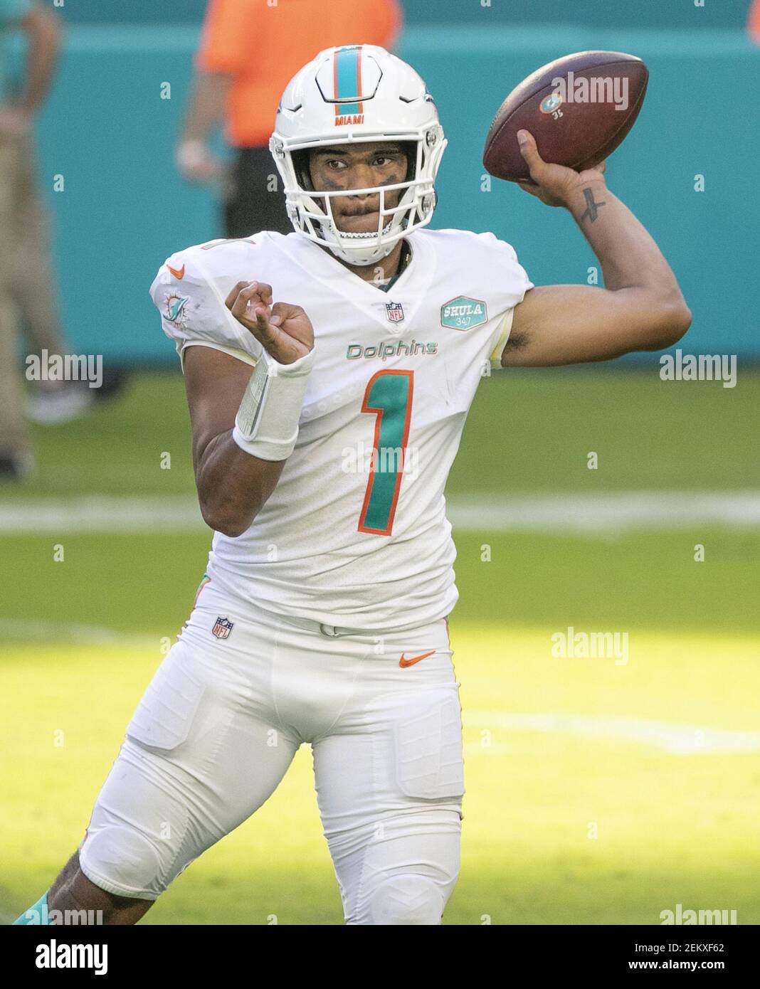Miami Dolphins quarterback Tua Tagovailoa (1) sets up to pass in the ...