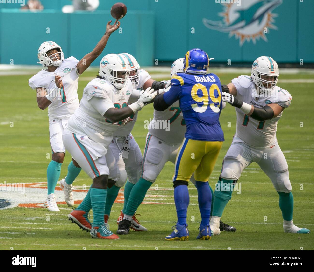 Miami Dolphins quarterback Tua Tagovailoa (1) sets up to pass in the ...