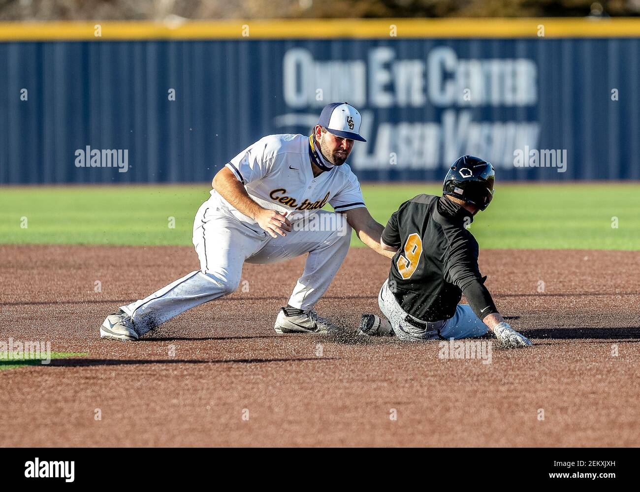 February 23, 2021: Central Oklahoma infielder Kyle Crowl (12) tags out ...