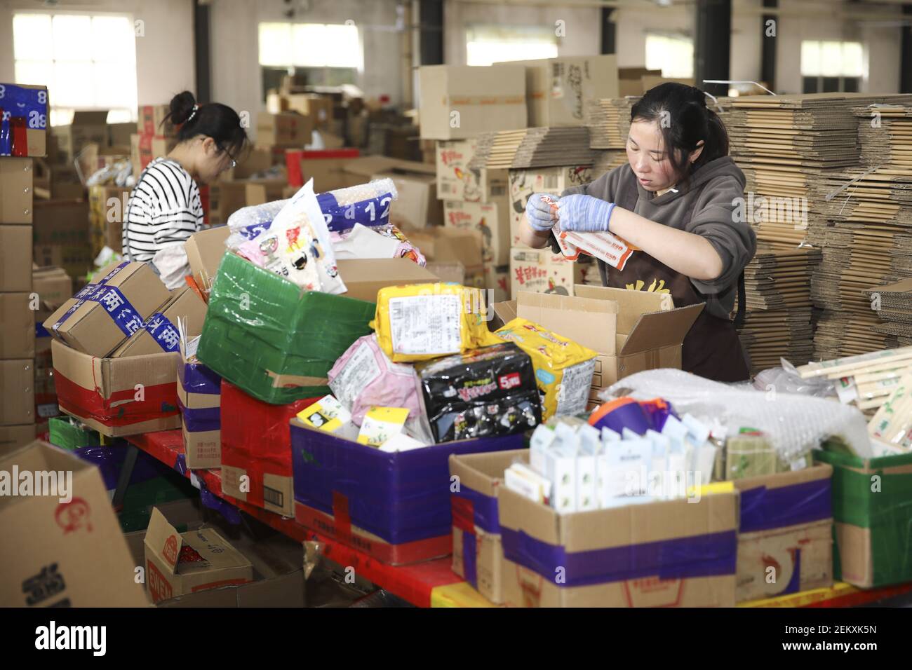 LIANYUNGANG, CHINA - NOVEMBER 2, 2020 - Workers in a warehouse of an ...