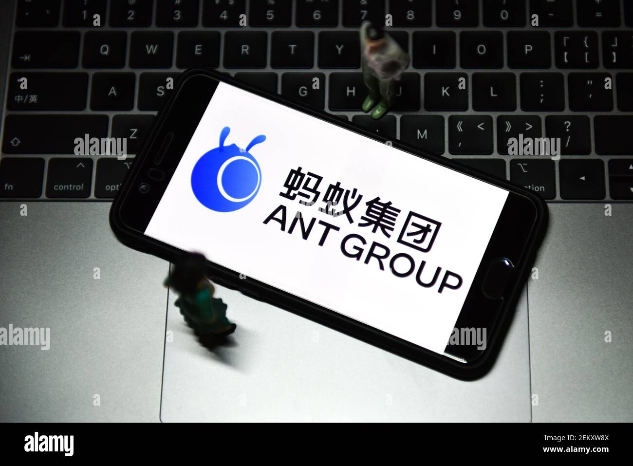 In this photo illustration an Ant Group logo seen displayed on a ...