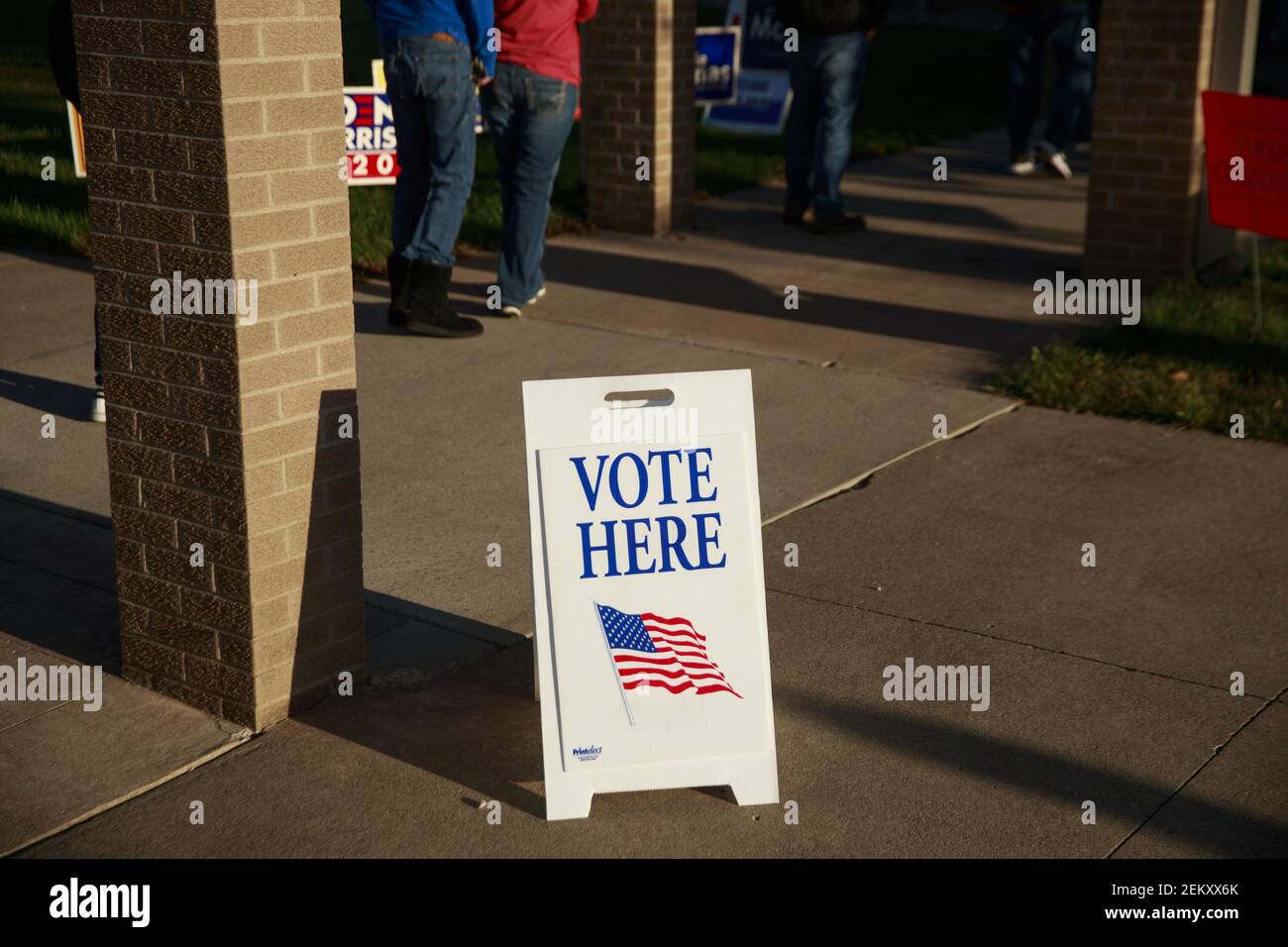 A "Vote here" sign seen on Election Day 2020 at St. John the Apostle ...