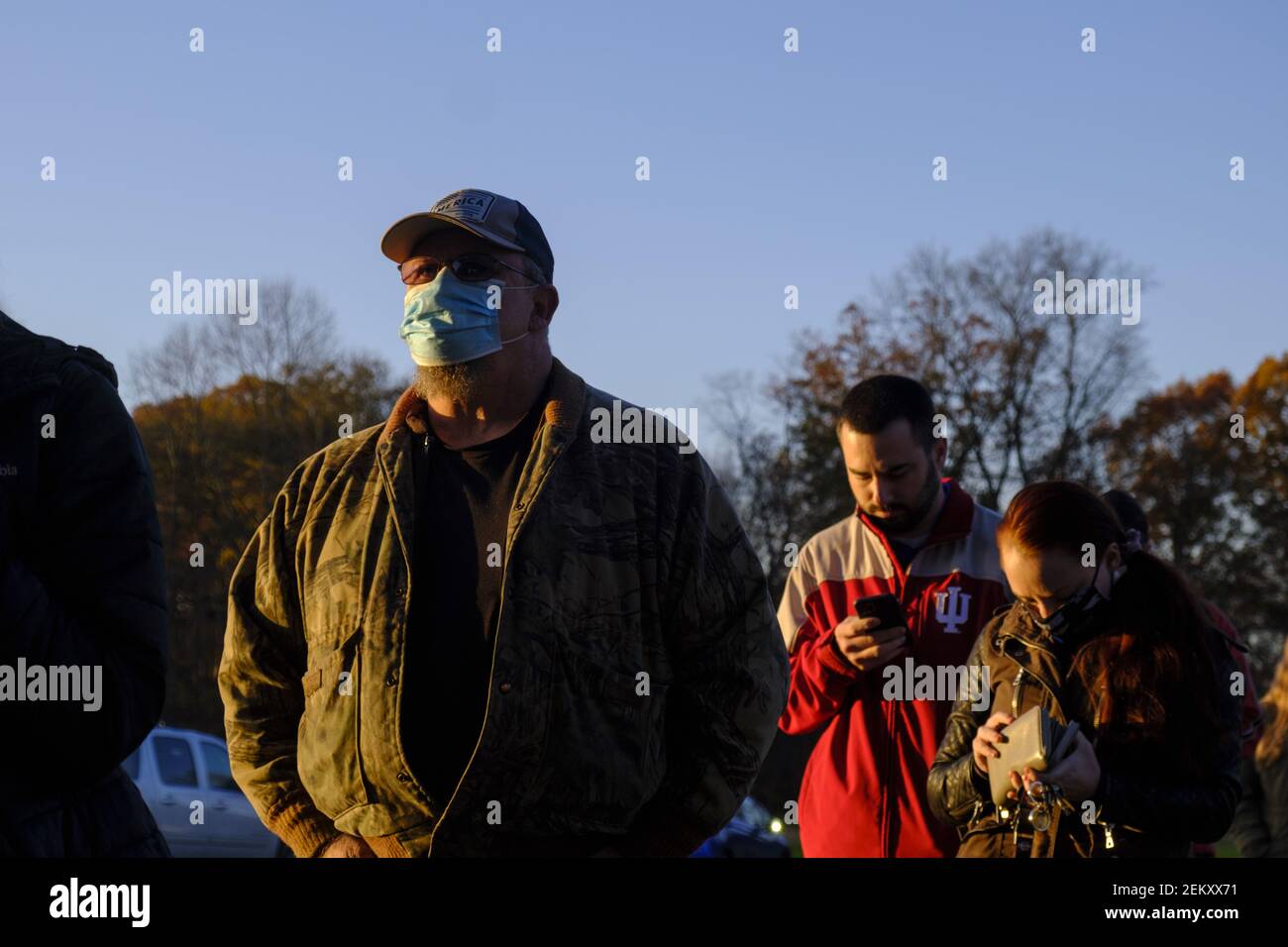 Voters line up on Election Day 2020 to cast their ballots at St. John ...