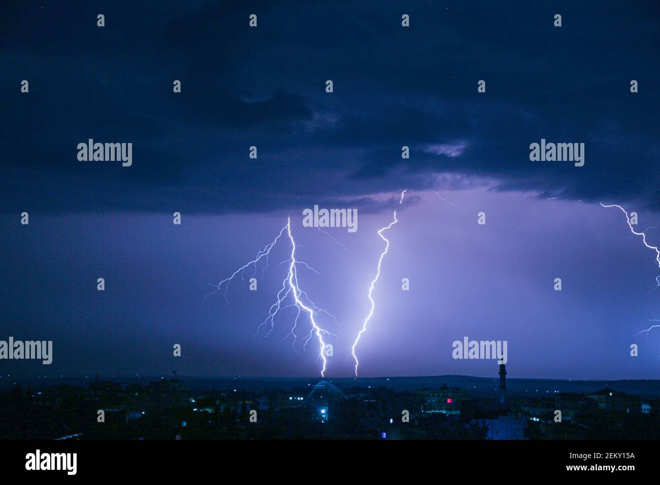 Lightning illuminates the night sky with heavy rains and bad weather ...