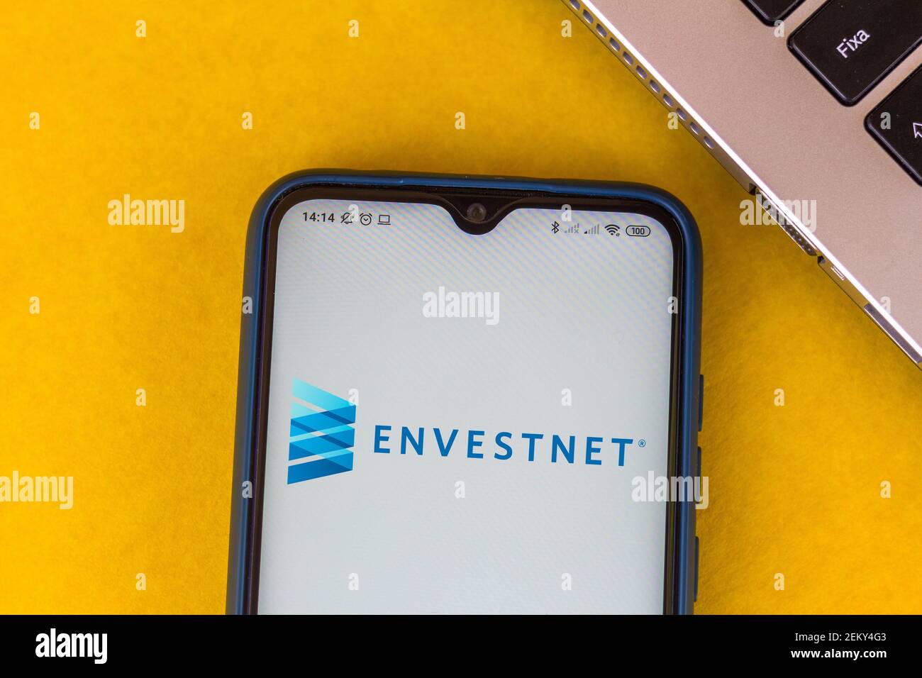 In this photo illustration the Envestnet logo seen displayed on a ...