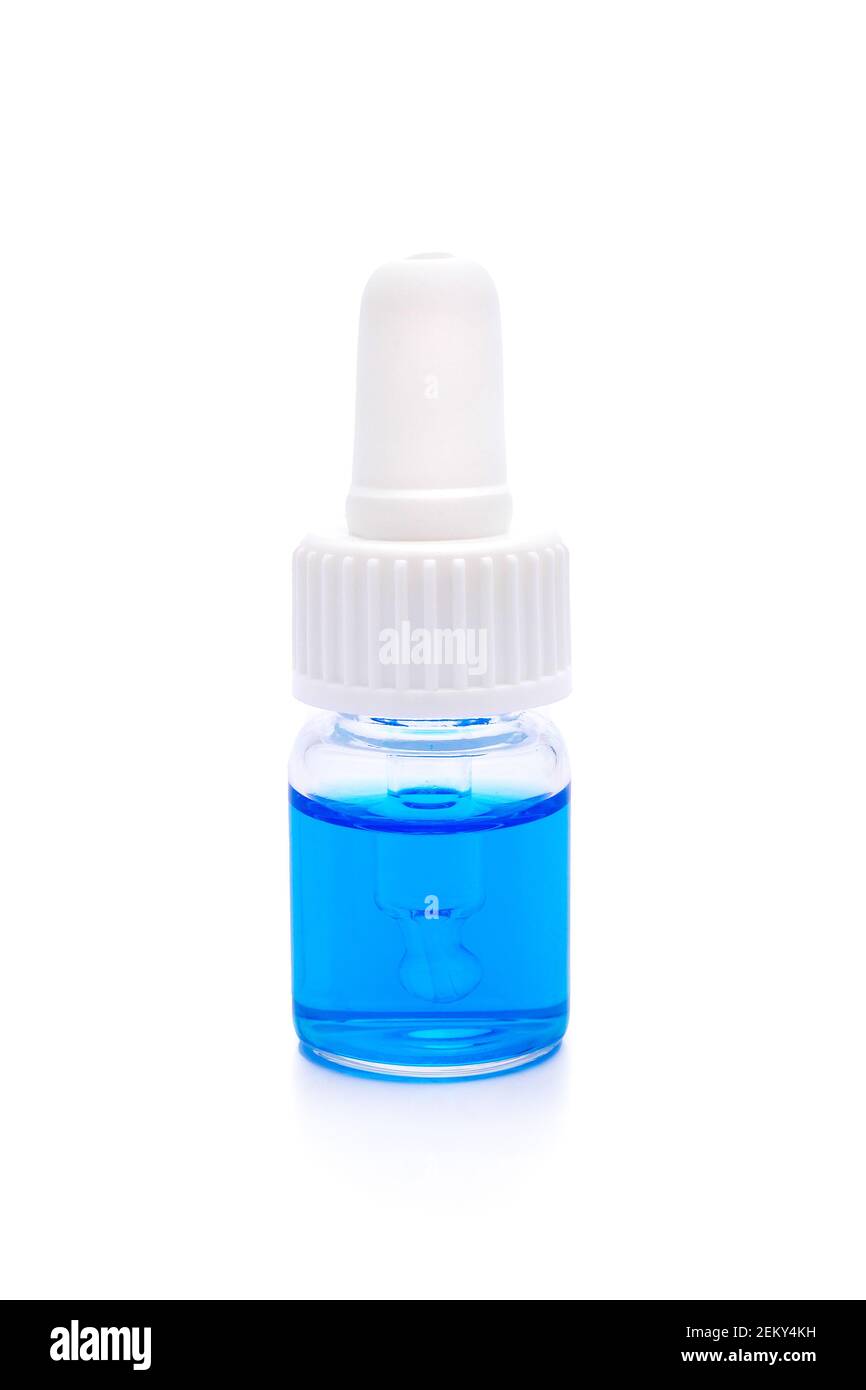 glass bottle with pipette with blue liquid isolated on white background ...