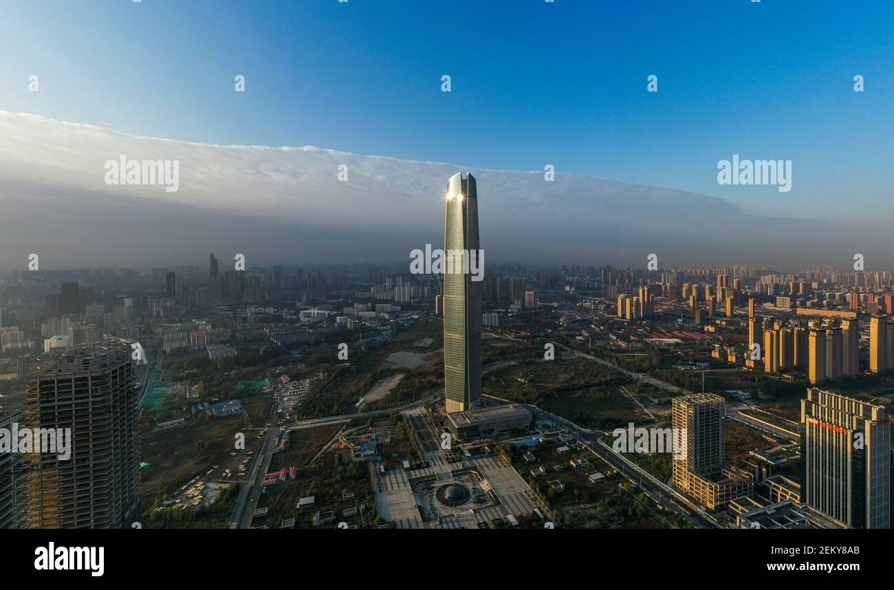 An aerial view of Wuhan Center, a local super tall skyscraper, erecting ...