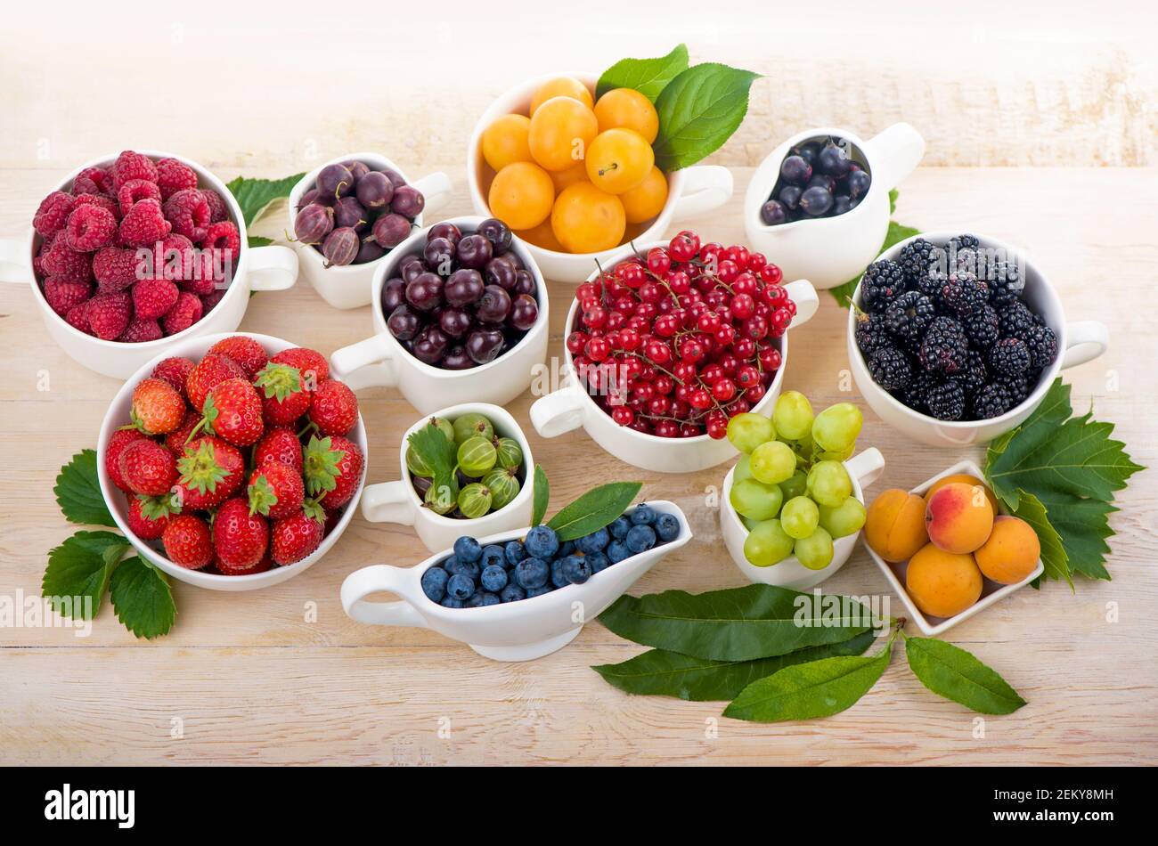 berry mix isolated on a white background Stock Photo - Alamy