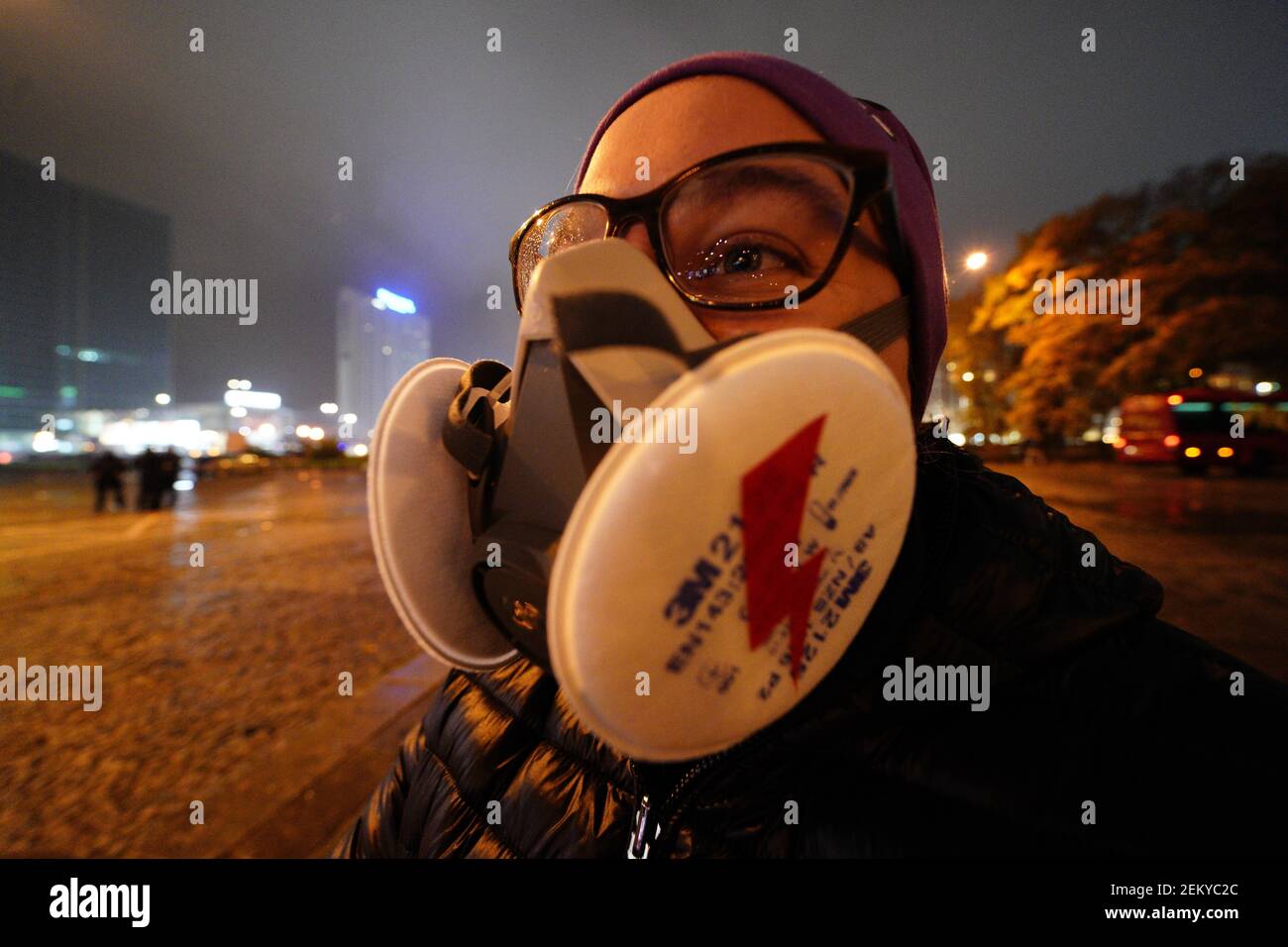 A woman has a red lightning bolt, the symbol of the women's rights ...