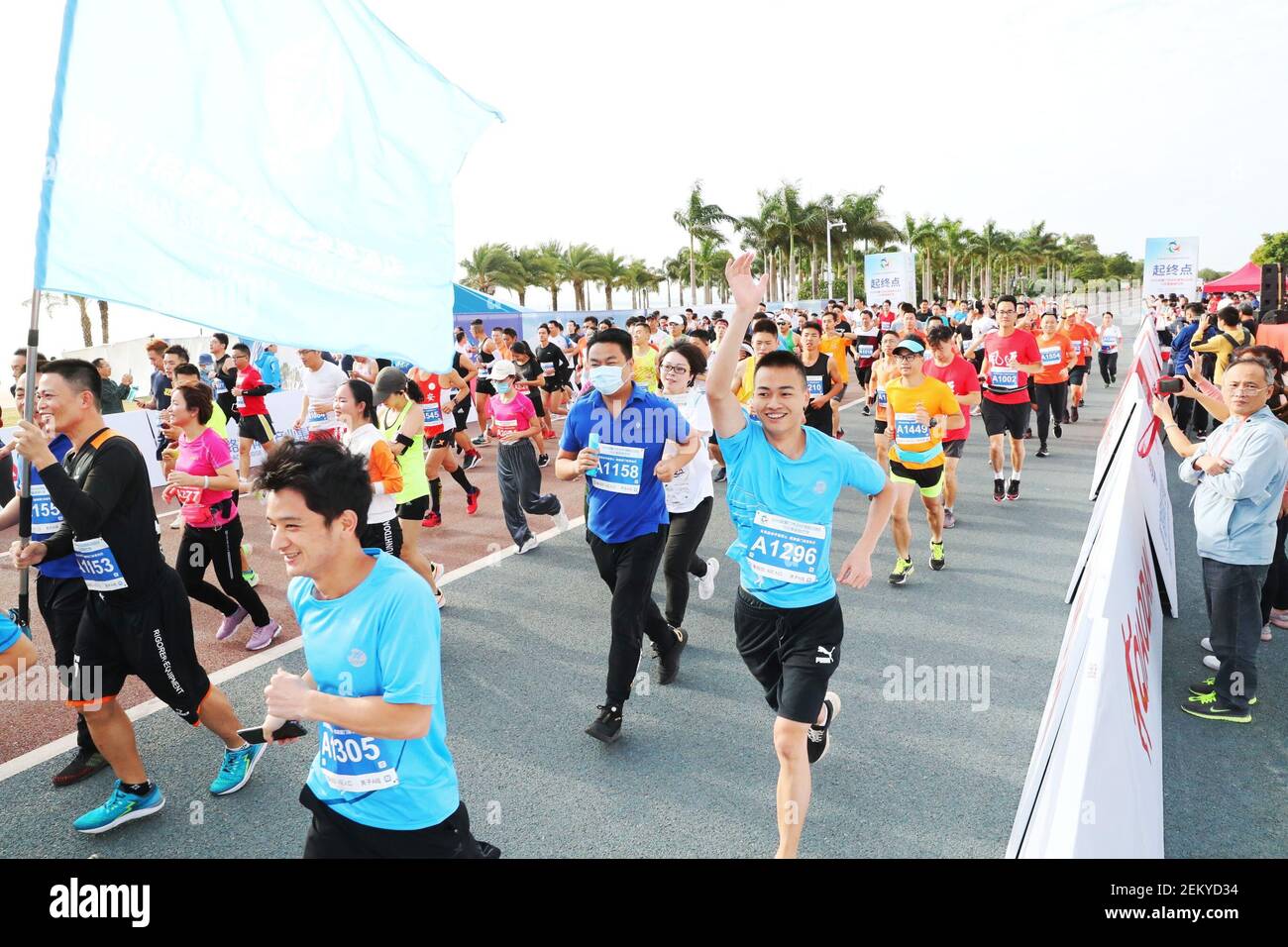 Participants run during a 10-km marathon of the 2020 Xiamen National ...