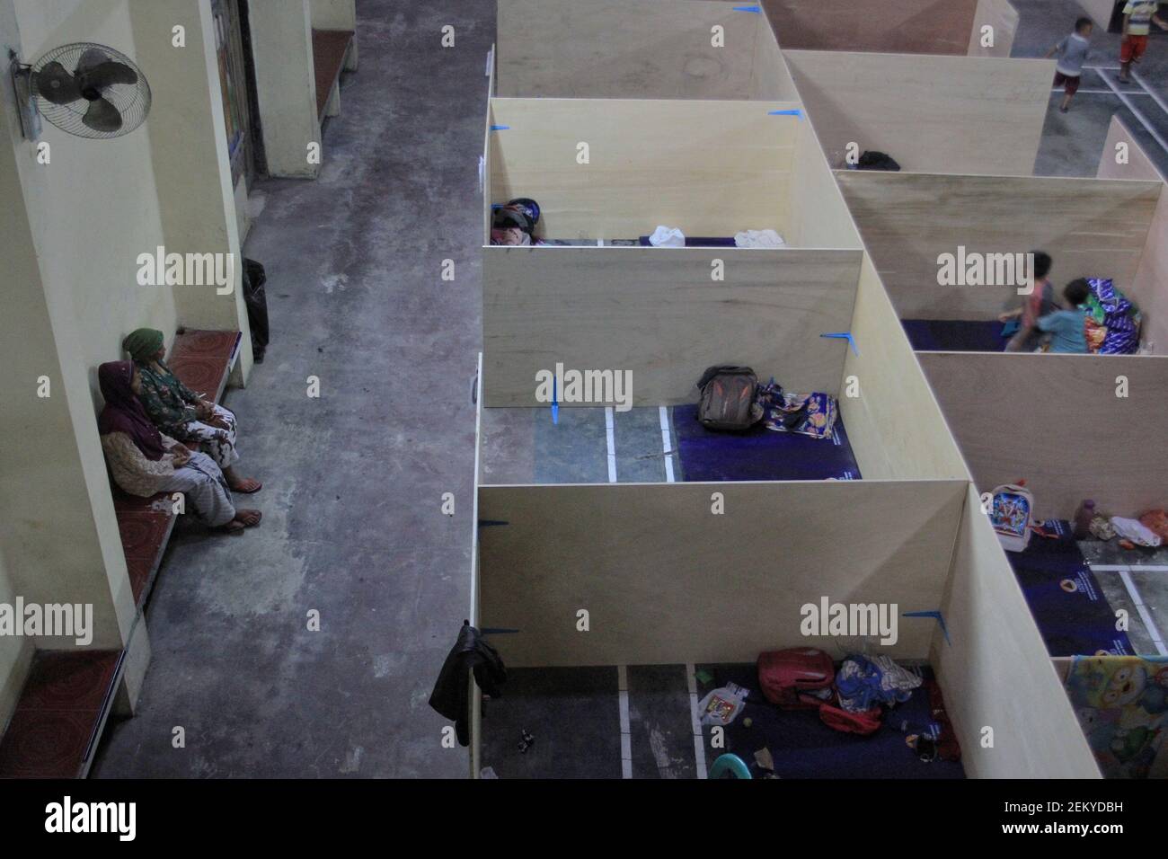 Mount Merapi refugees at a shelter in Deyangan village Hall in Magelang ...