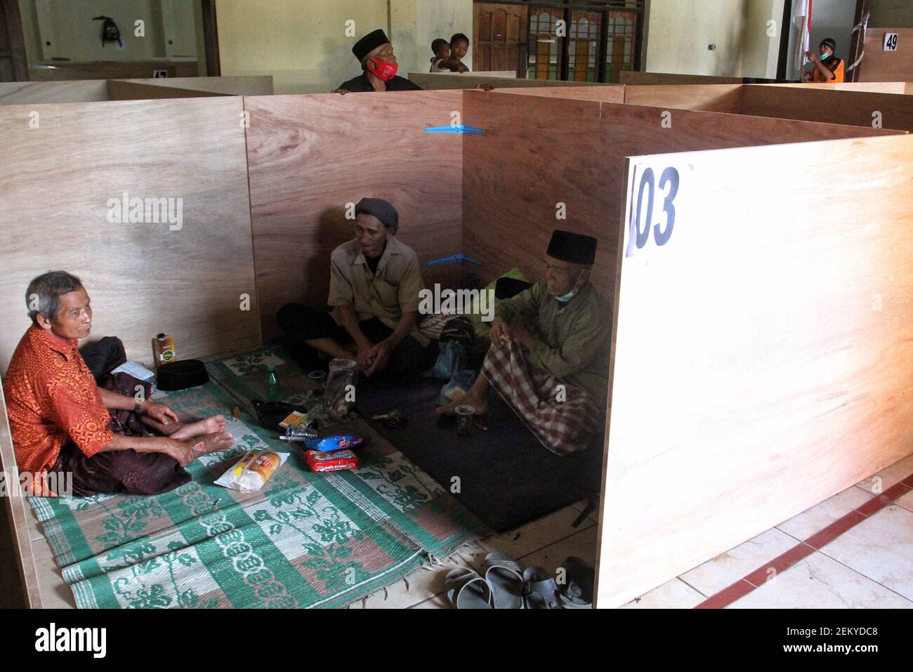 Mount Merapi refugees at a shelter in Deyangan village Hall in Magelang ...