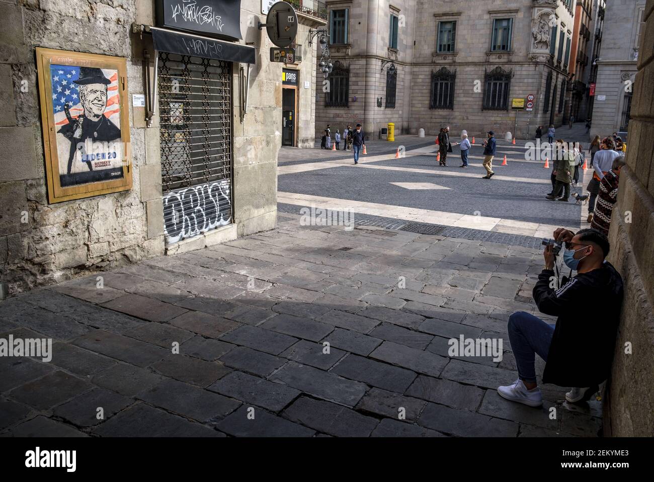 A person photographing the new graffiti. Street graffiti artist tvBoy ...