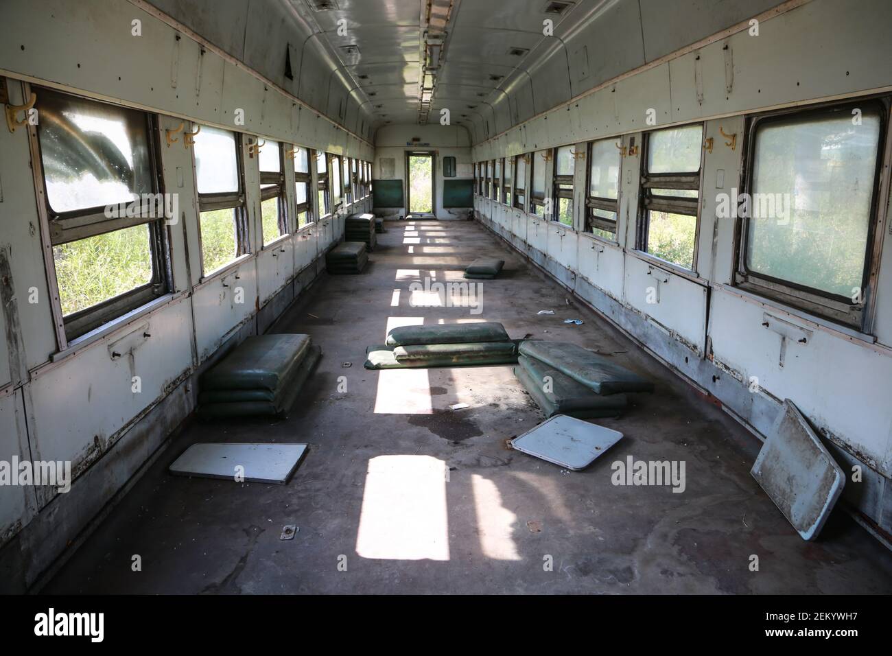 There are piles of abandoned green-skinned trains on the train ...