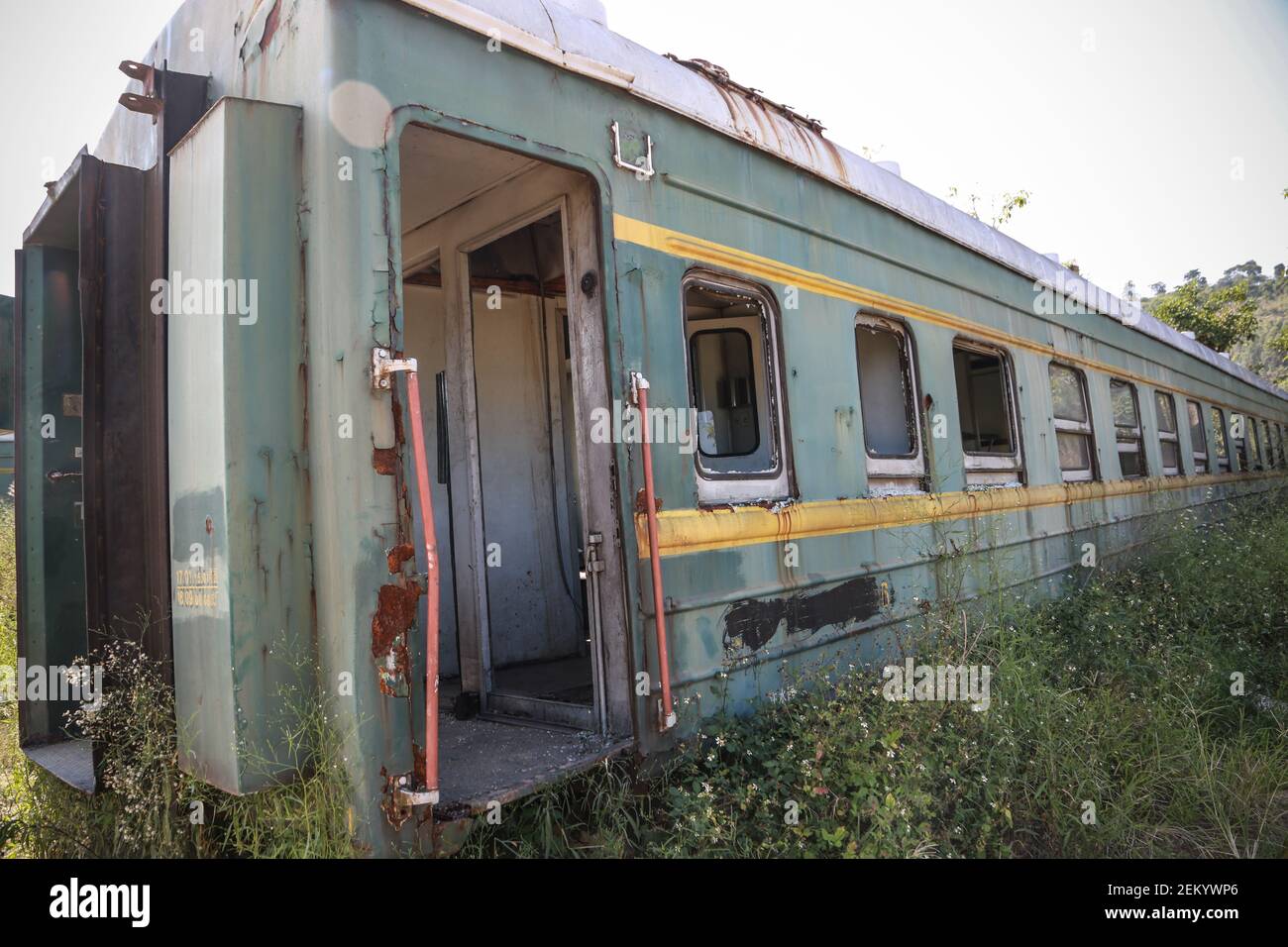 There are piles of abandoned green-skinned trains on the train ...