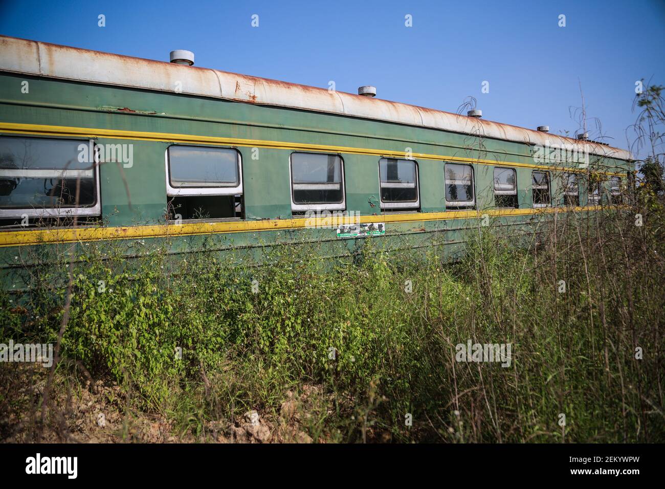 There are piles of abandoned green-skinned trains on the train ...
