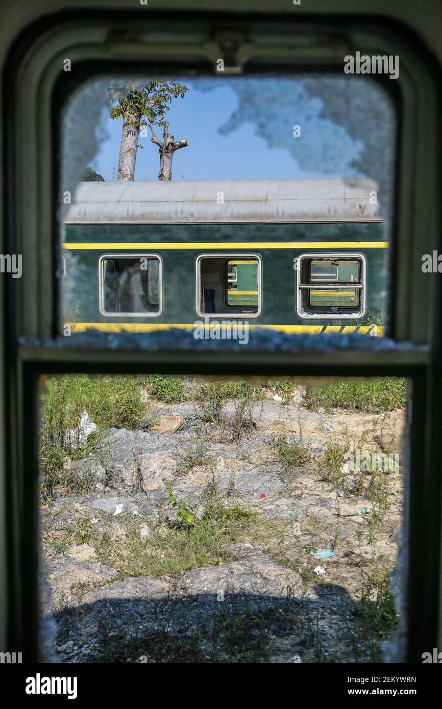 There are piles of abandoned green-skinned trains on the train ...