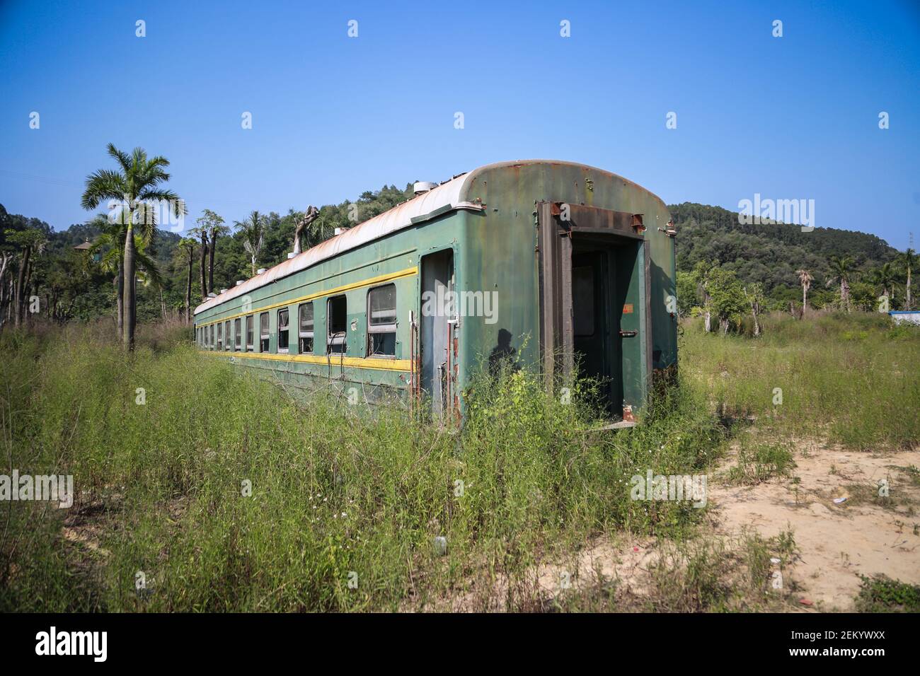 There are piles of abandoned green-skinned trains on the train ...