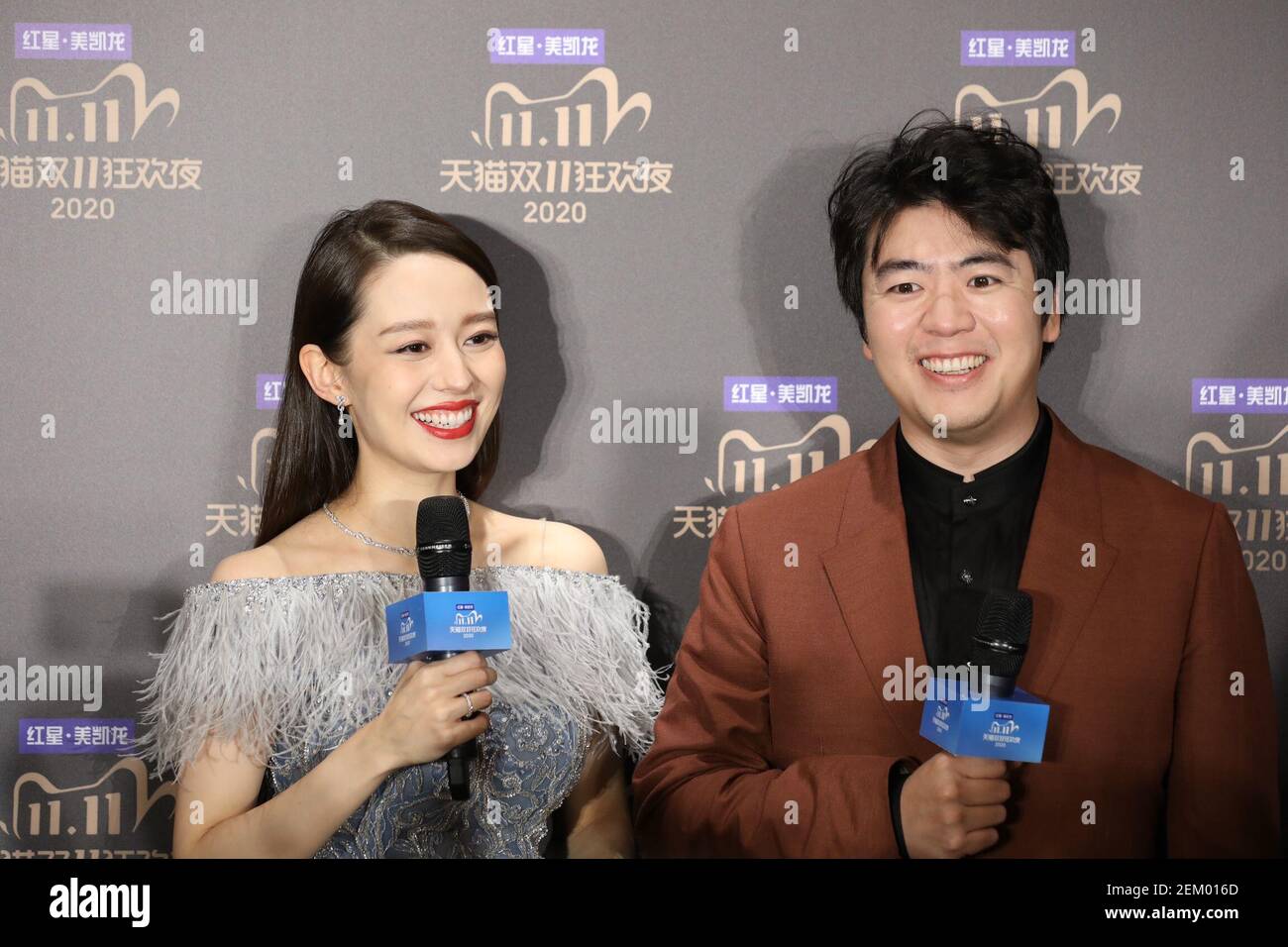 Chinese concert pianist Lang Lang, right, and his wife Gina Alice ...