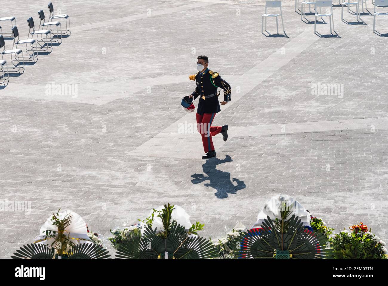 French army soldier is seen running while wearing a protective mask ...